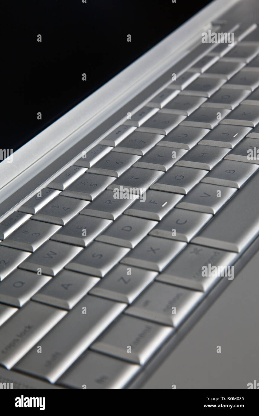 Modern silver Laptop keyboard concept photo Stock Photo - Alamy