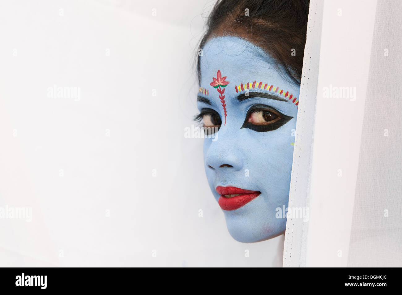 Indian girl, face painted as the Hindu goddess Sita. India Stock Photo ...