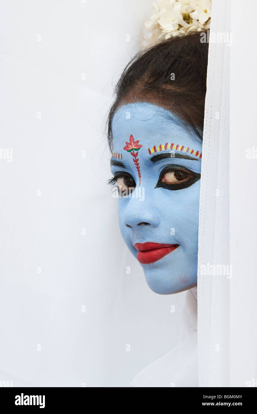 Indian girl, face painted as the Hindu goddess Sita. India Stock Photo ...
