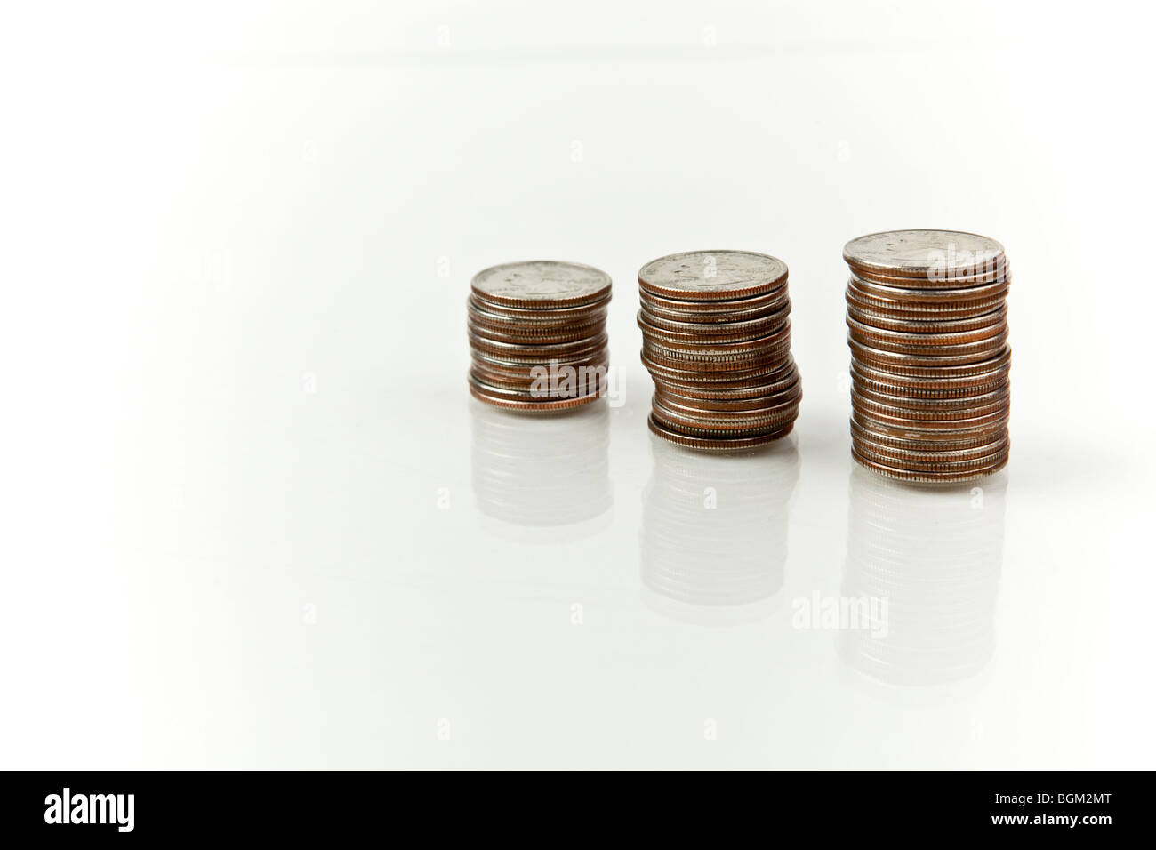 three stack of us quarters Stock Photo - Alamy