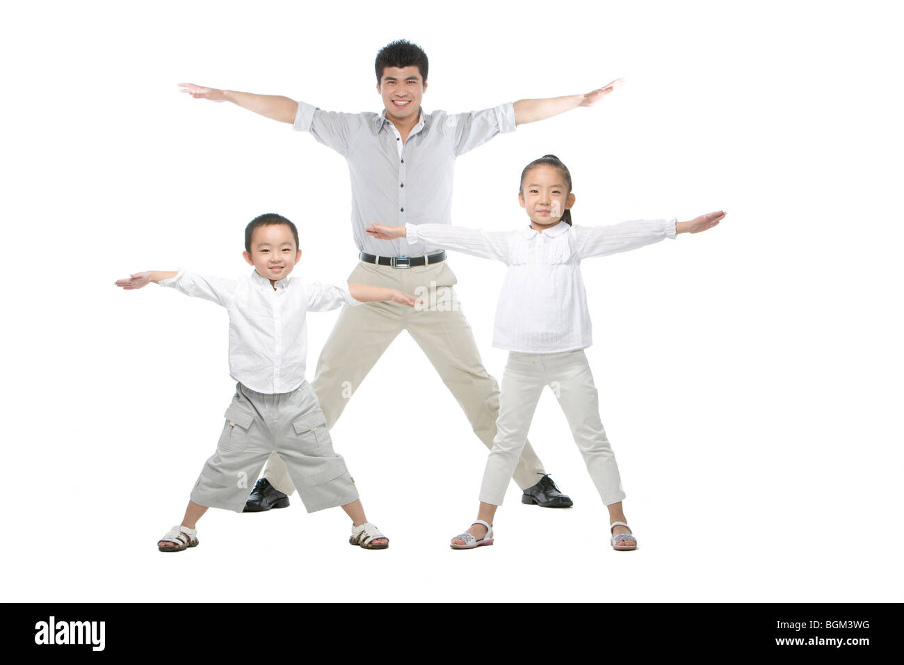 Father and children arms outstretched Stock Photo - Alamy