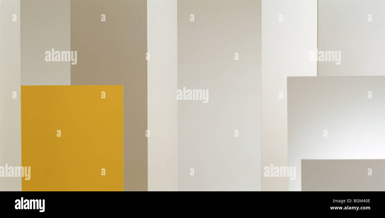 Room with white and yellow wall segments Stock Photo - Alamy
