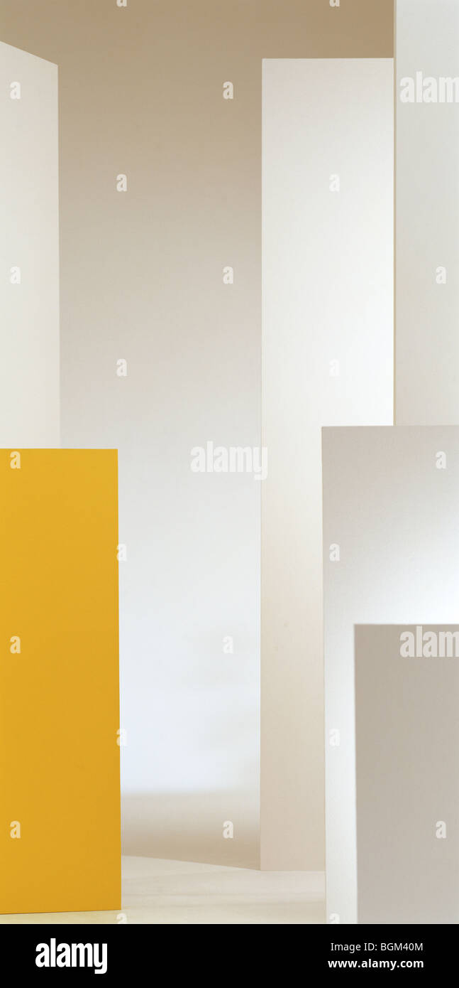 Room with white and yellow wall segments Stock Photo - Alamy