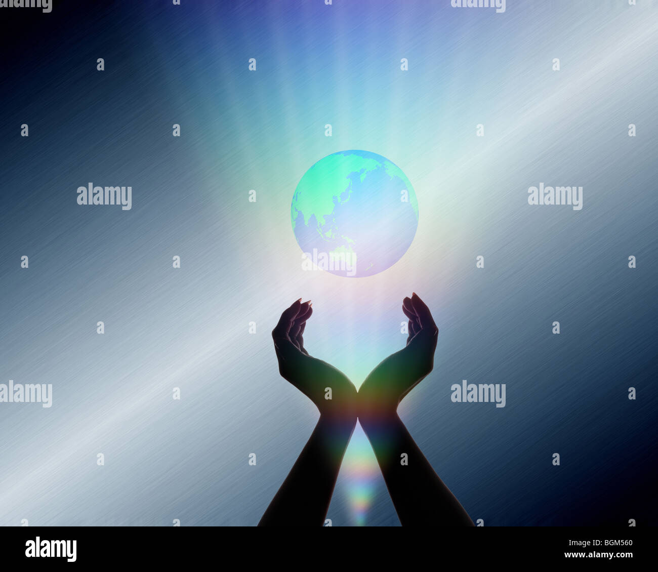 Hands reaching up towards a globe Stock Photo - Alamy