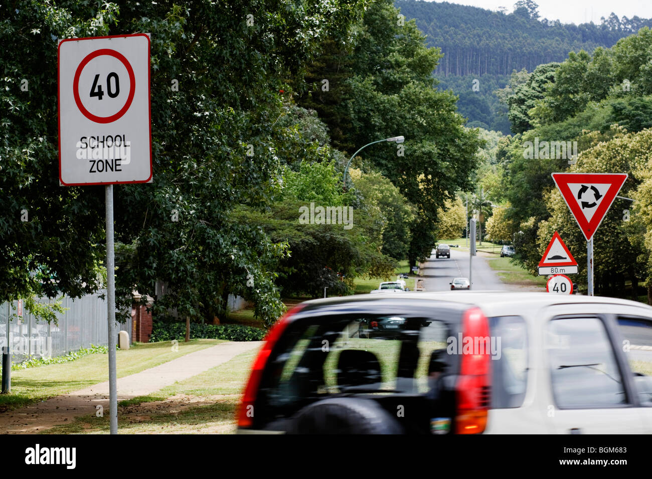Road safety warning sign of restricted speed in school zone ...