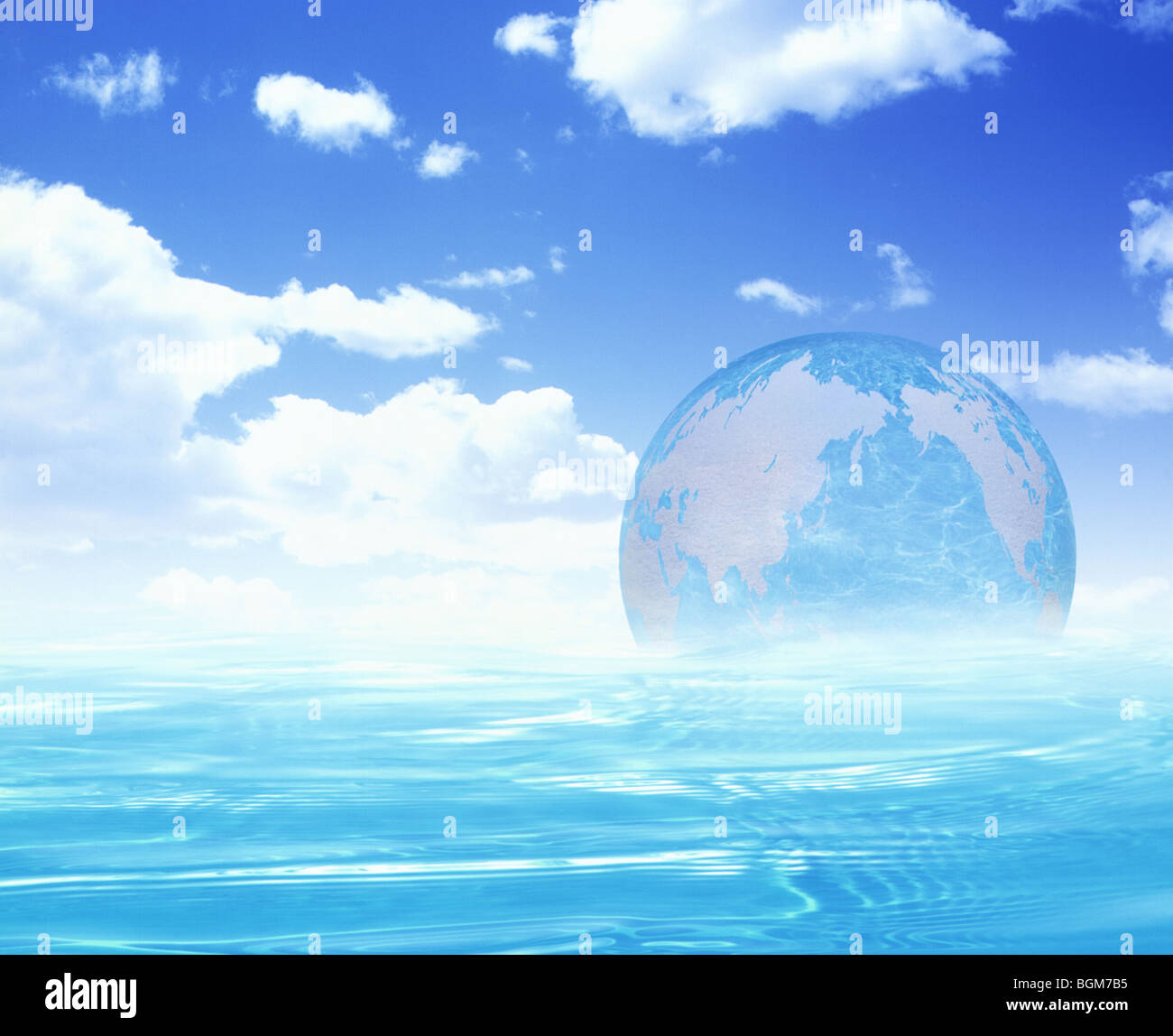Globe floating in water Stock Photo - Alamy