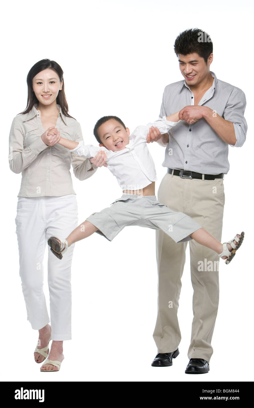 Portrait of a family of three Stock Photo - Alamy
