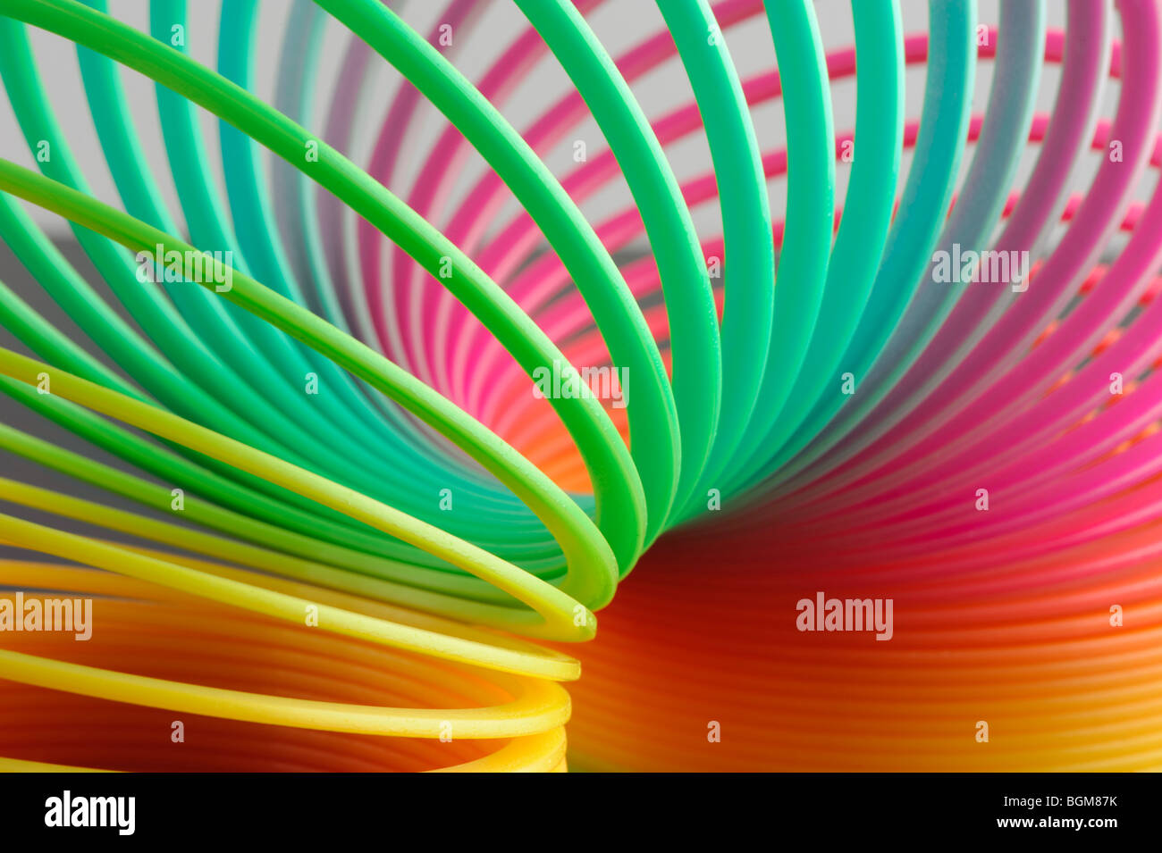 composition of a colorful toy coil Stock Photo - Alamy