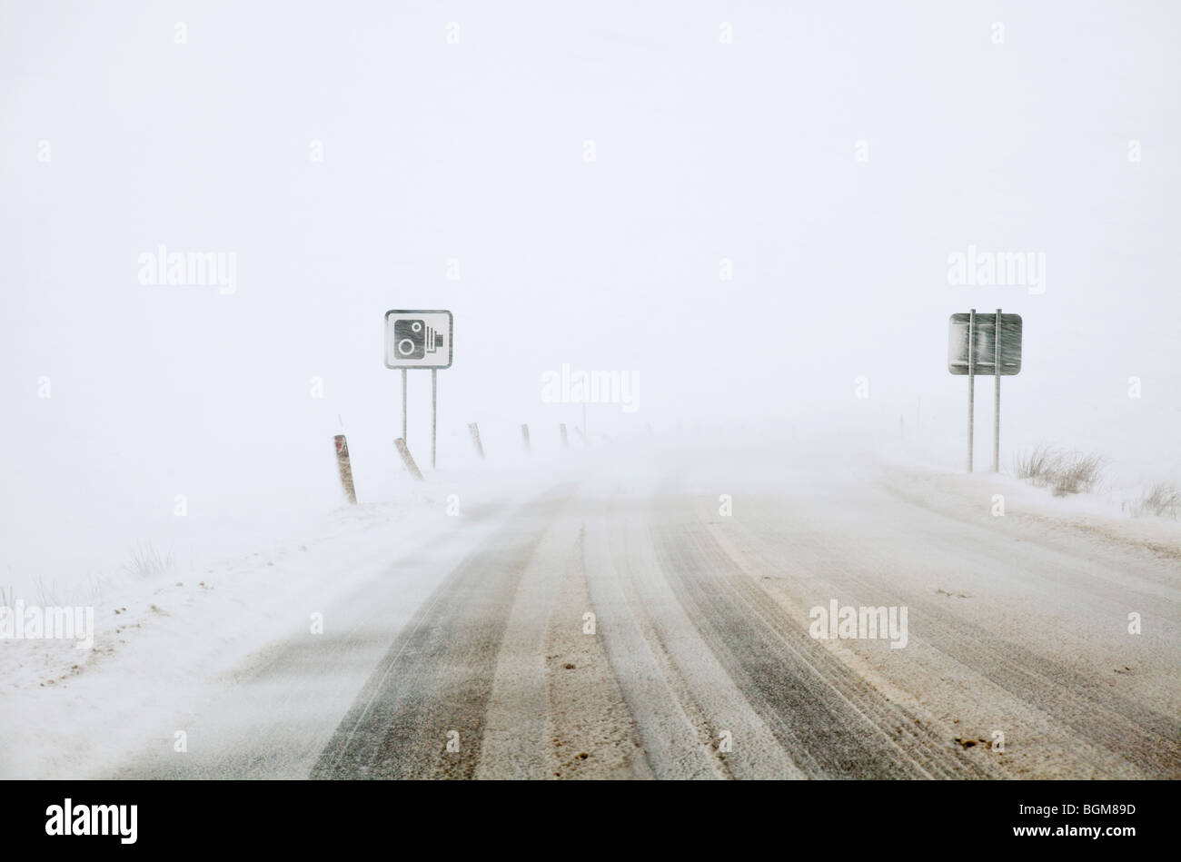 Sign for Speed Camera in a snow blizzard on the A82 Scotland Stock ...