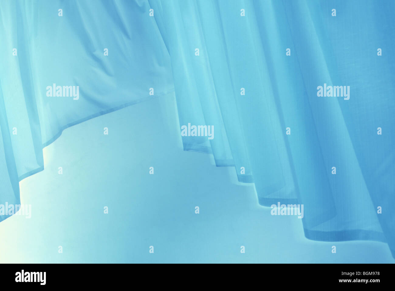 An elegantly-draped cloth hanging Stock Photo - Alamy