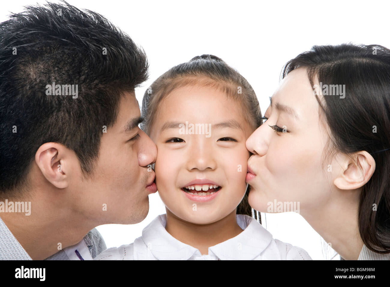 Portrait of a family of three Stock Photo - Alamy