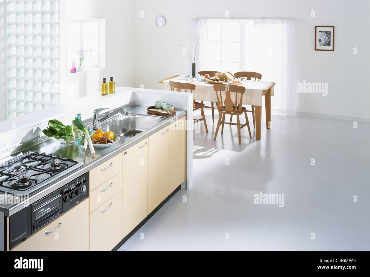 Kitchen counter and dining table Stock Photo - Alamy