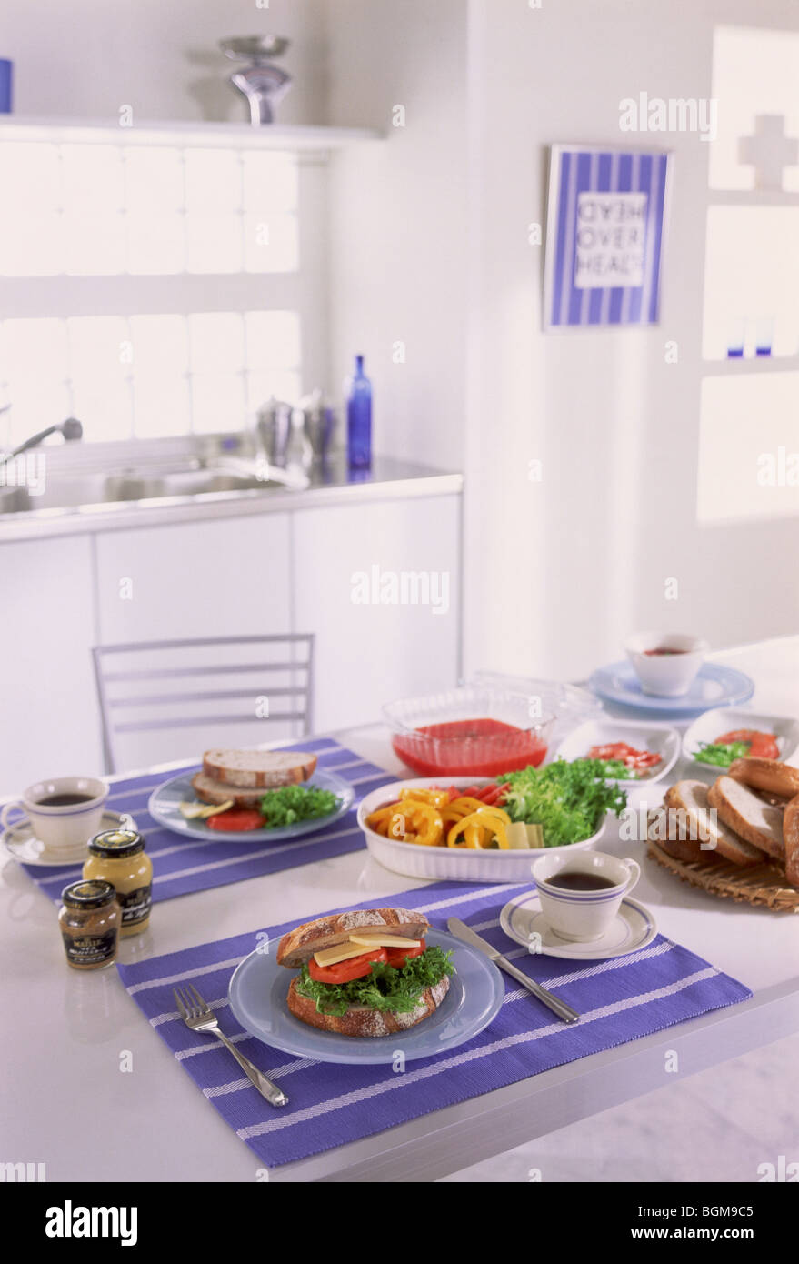 Food arranged on dining table Stock Photo - Alamy