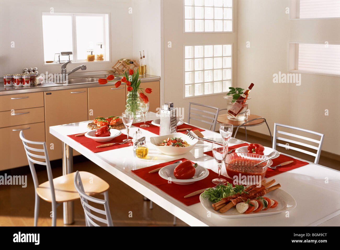 Dining table with meal for four Stock Photo - Alamy