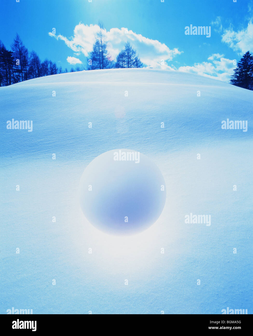 Sphere floating over snowy landscape Stock Photo - Alamy