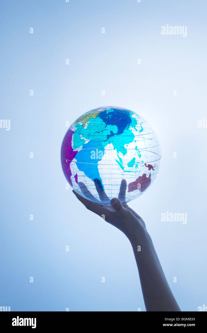 Person globe hi-res stock photography and images - Alamy