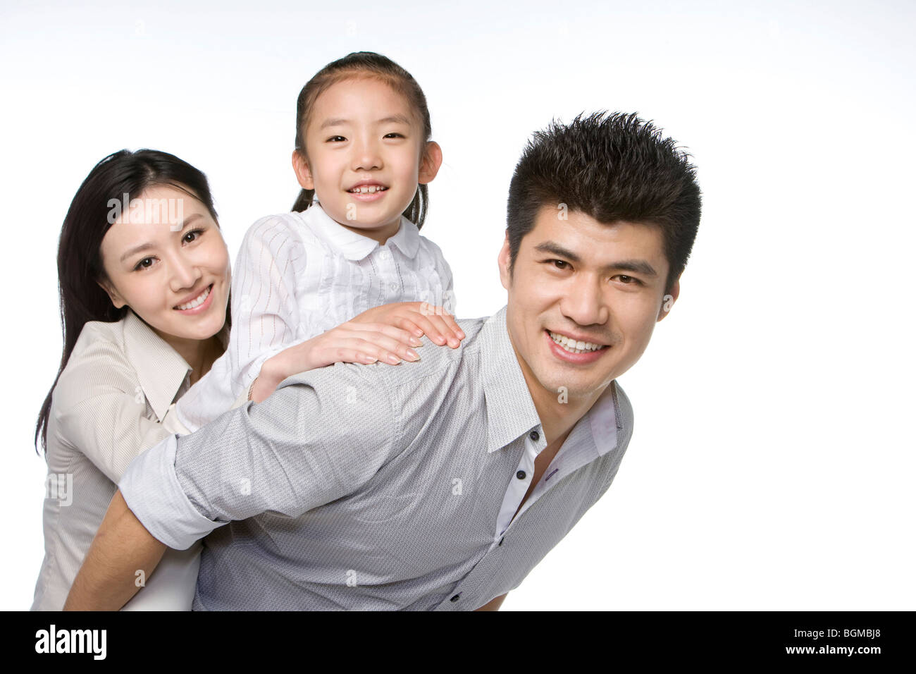 Portrait of a family of three Stock Photo - Alamy