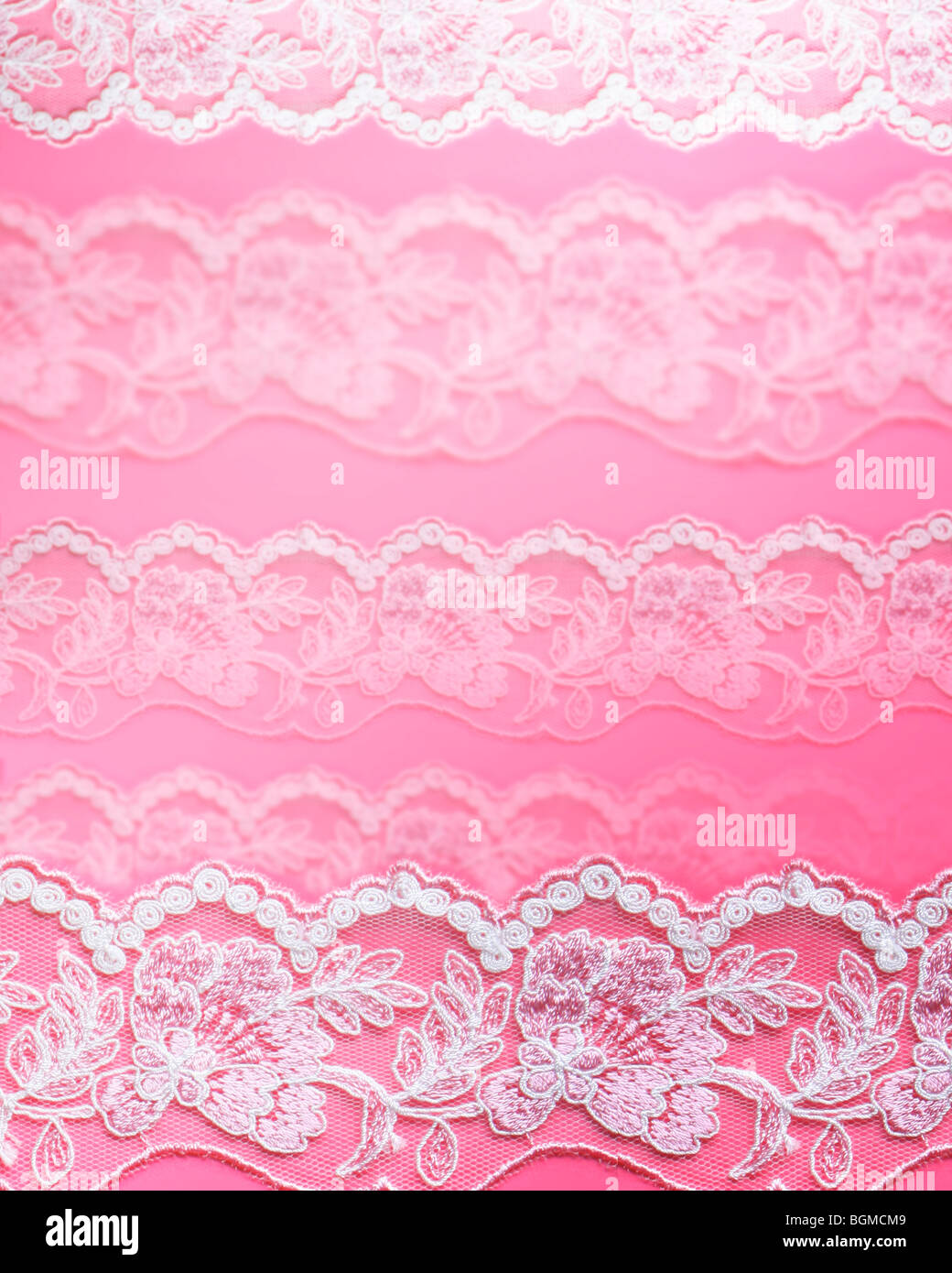 Lace on a pink background Stock Photo - Alamy