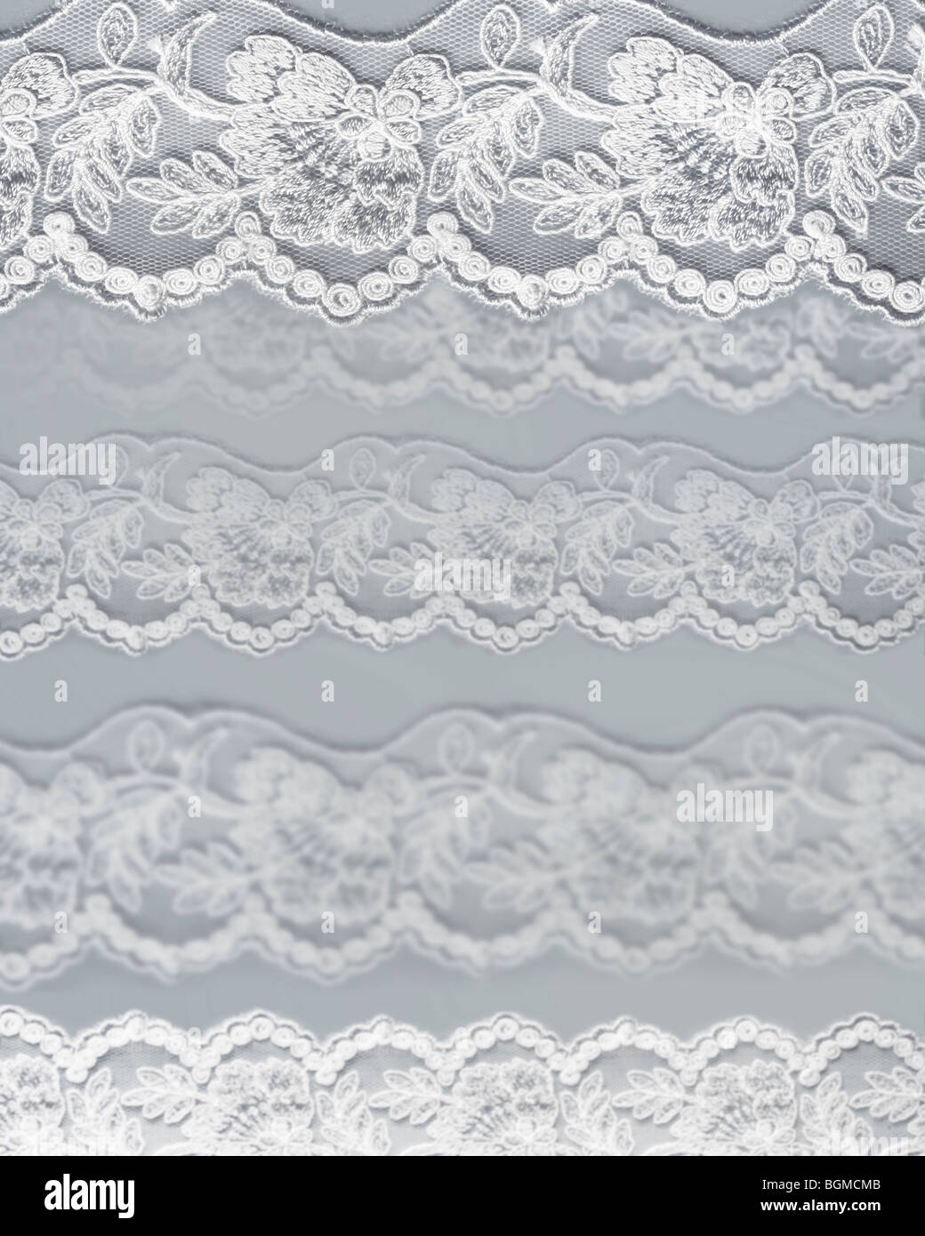 Lace on a grey background Stock Photo - Alamy