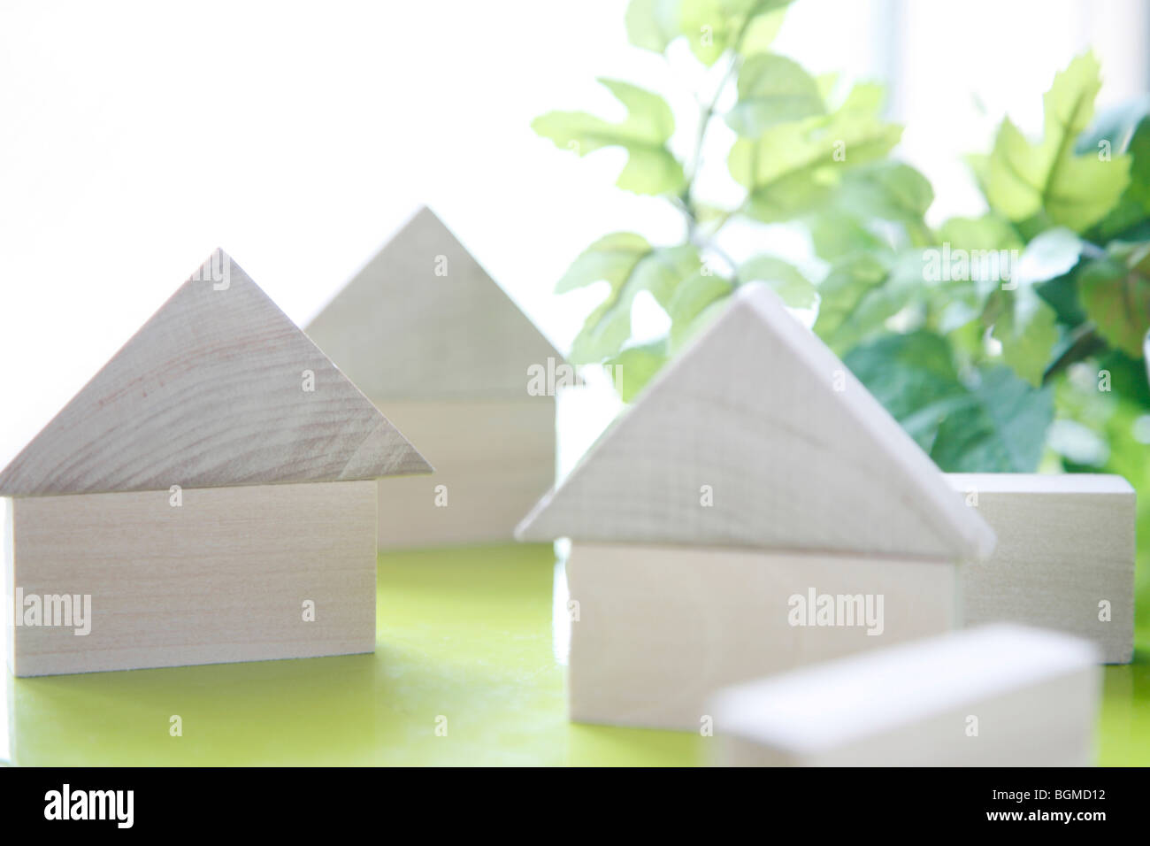 White blocks stacked in house shapes Stock Photo - Alamy