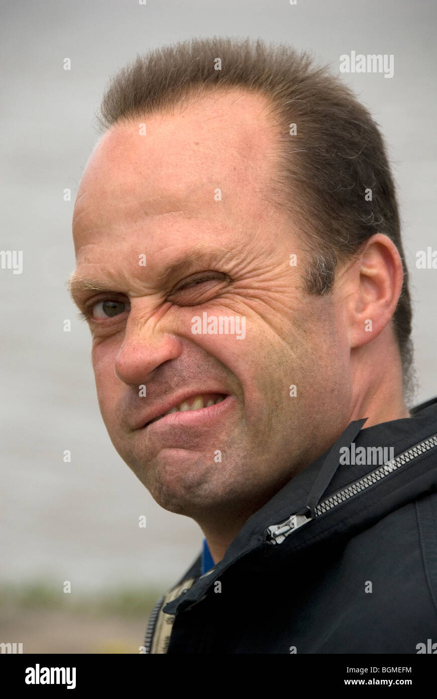 Man pulling a face, UK Stock Photo - Alamy