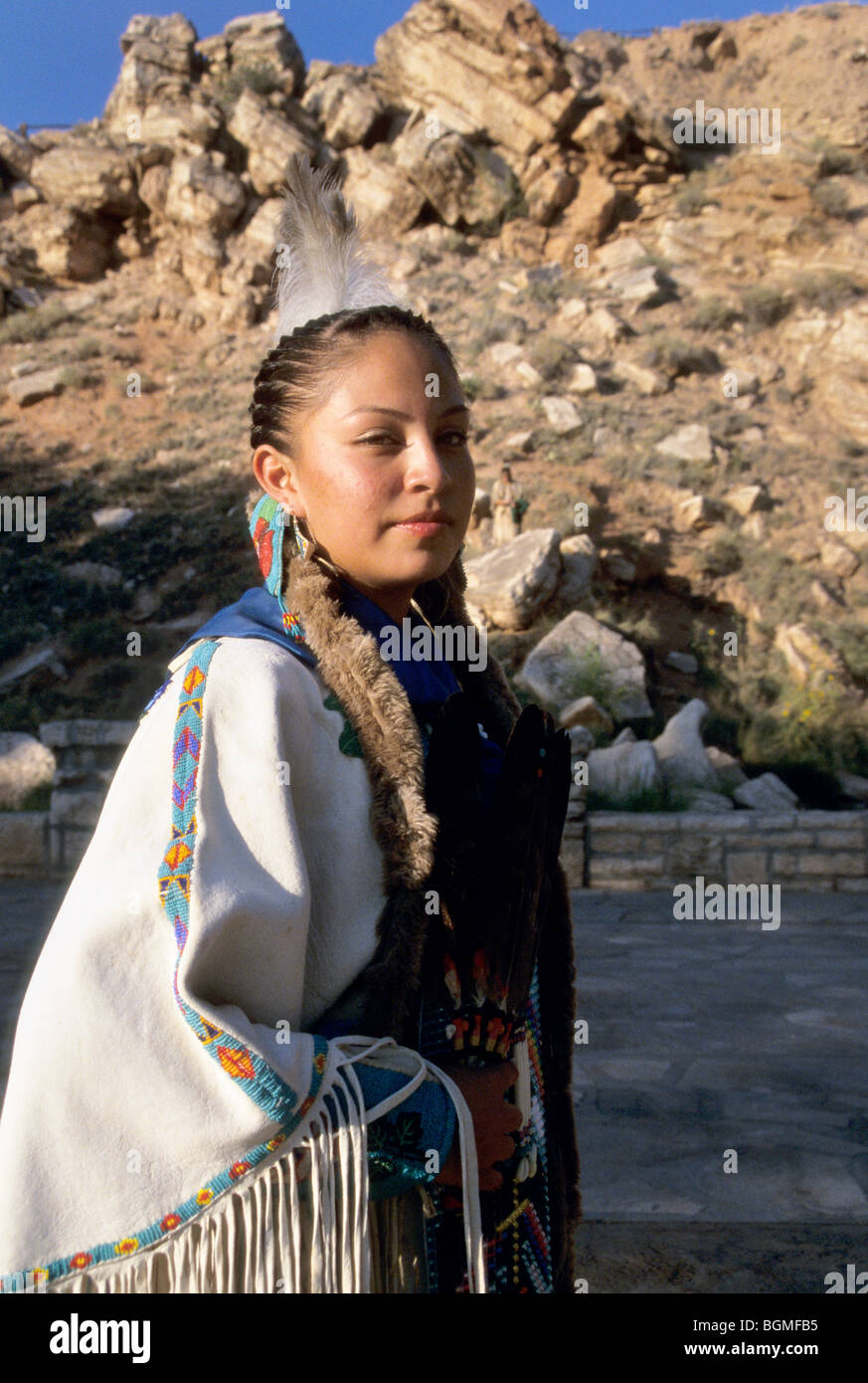 Arapaho teenage girl dressed in traditional regalia decorated with ...