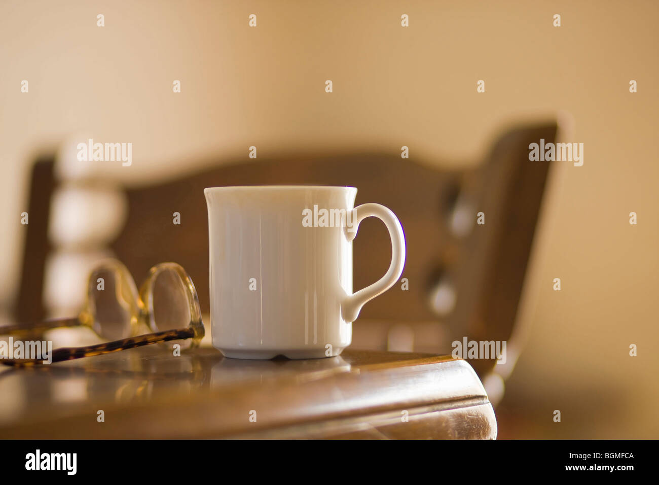 Coffee cup on table Stock Photo - Alamy
