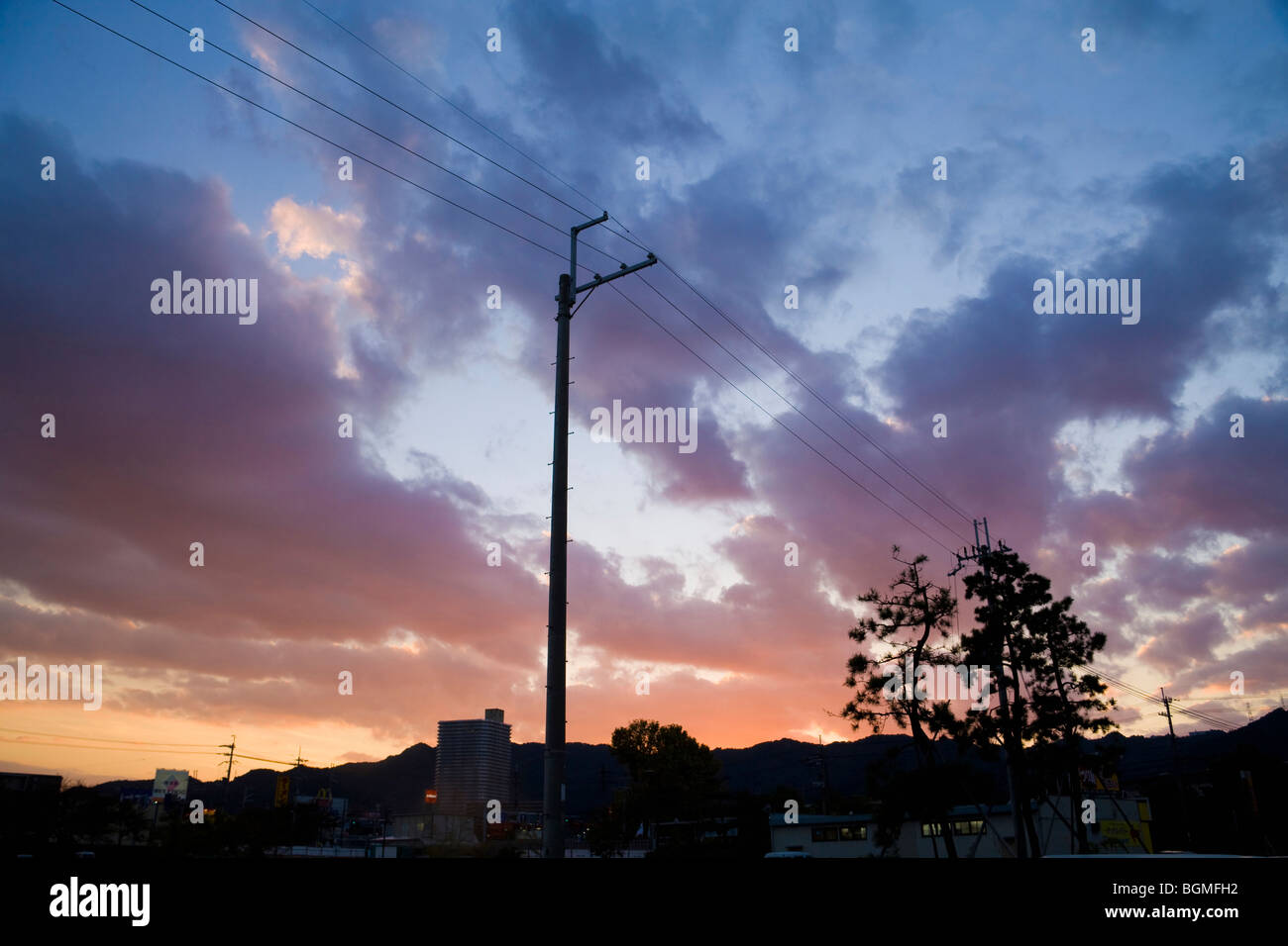 A Town at Sunset Stock Photo - Alamy