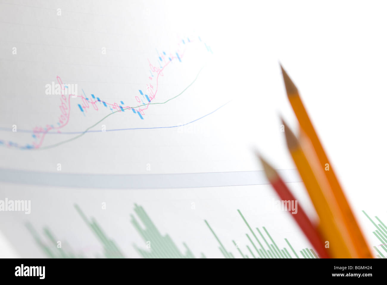 Pencils pointing to graph Stock Photo - Alamy