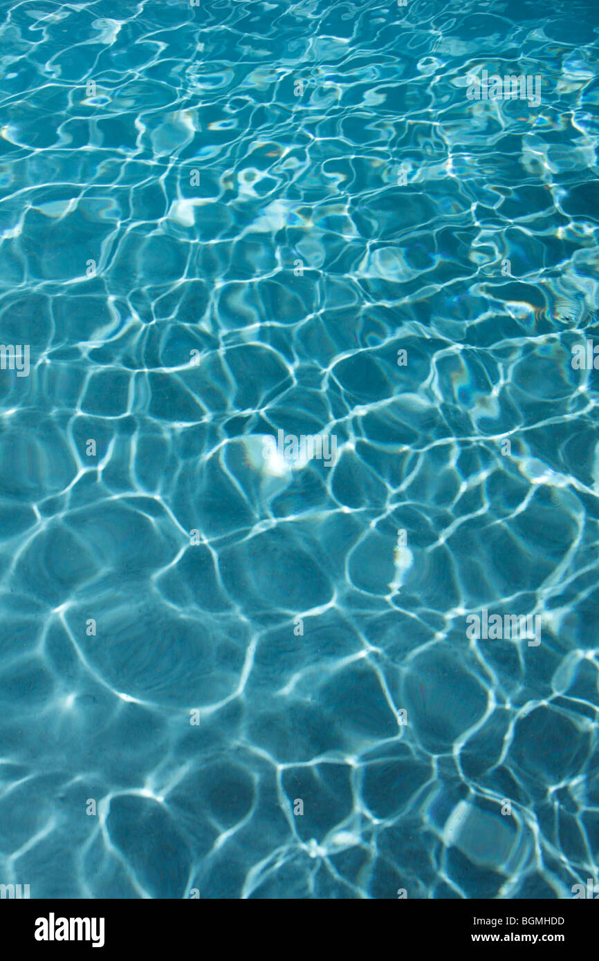 Reflections on the water of a swimming-pool Stock Photo - Alamy