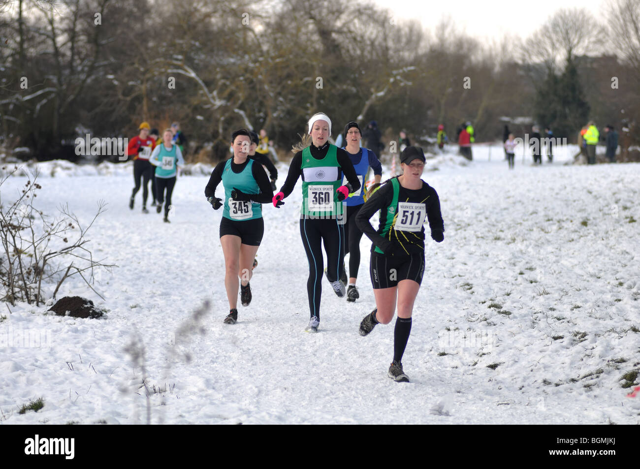 Women`s cross country running race in snow Stock Photo - Alamy