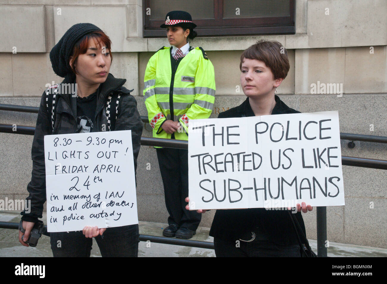 Protest at HQ of City of London Police. Placard claims they "treated us ...