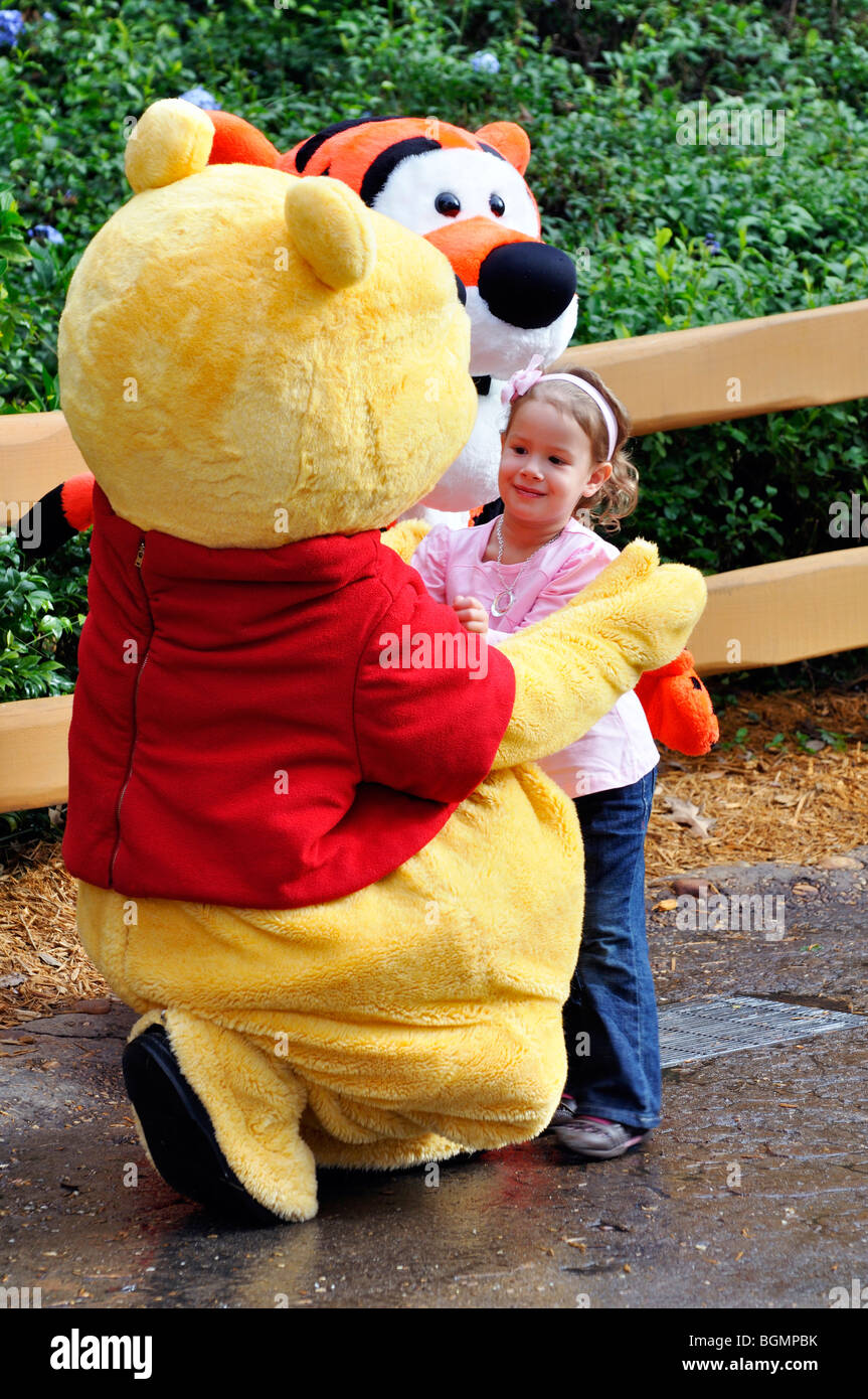Disney character hugging child hi-res stock photography and images - Alamy