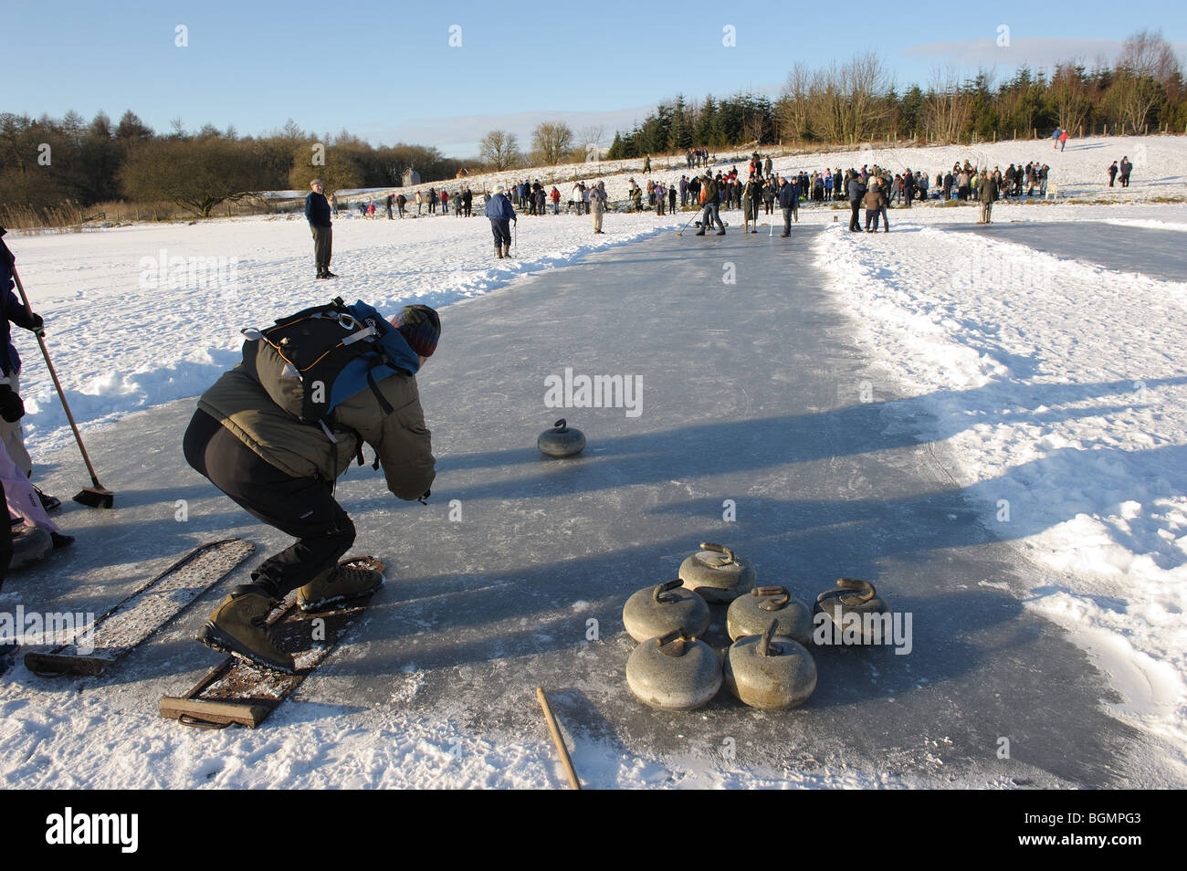 Outdoor curling match - bonspeil - on frozen Bush Loch, near Gatehouse ...