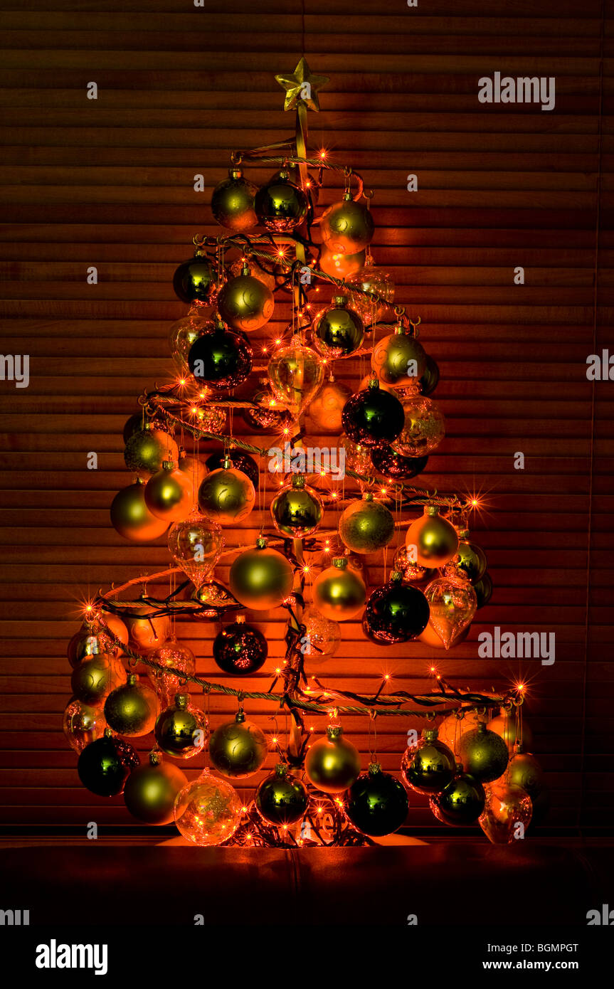 Gold spiral Christmas tree and baubles Stock Photo - Alamy
