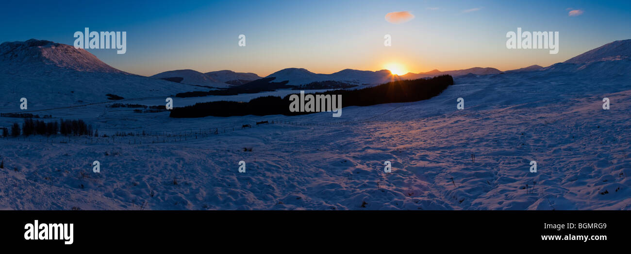 Panorama of a sunset over the Scottish Munro Achallader An Torr in the ...