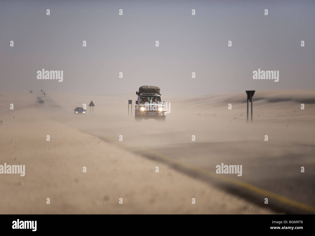 Driving along a road through the namibian desert Stock Photo - Alamy