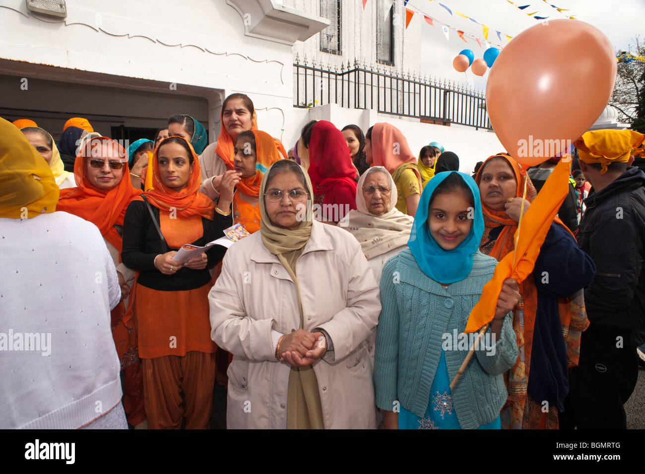 Crowd of Sikh women outside the Slough Gurdwara Sri Guru Singh Sabha ...