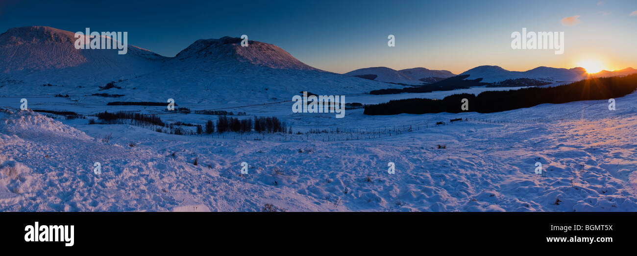 Panorama of a sunset over the Scottish Munro Achallader An Torr in the ...