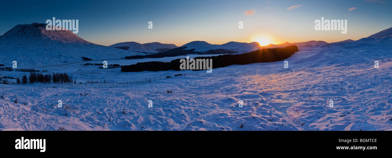 Panorama of a sunset over the Scottish Munro Achallader An Torr in the ...