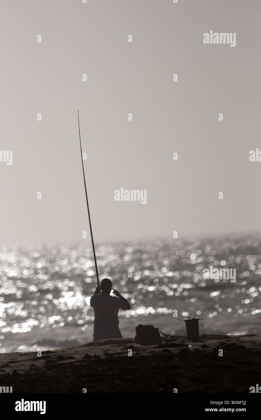 Fishing off the beach. Walvis Bay, Namibia Stock Photo - Alamy