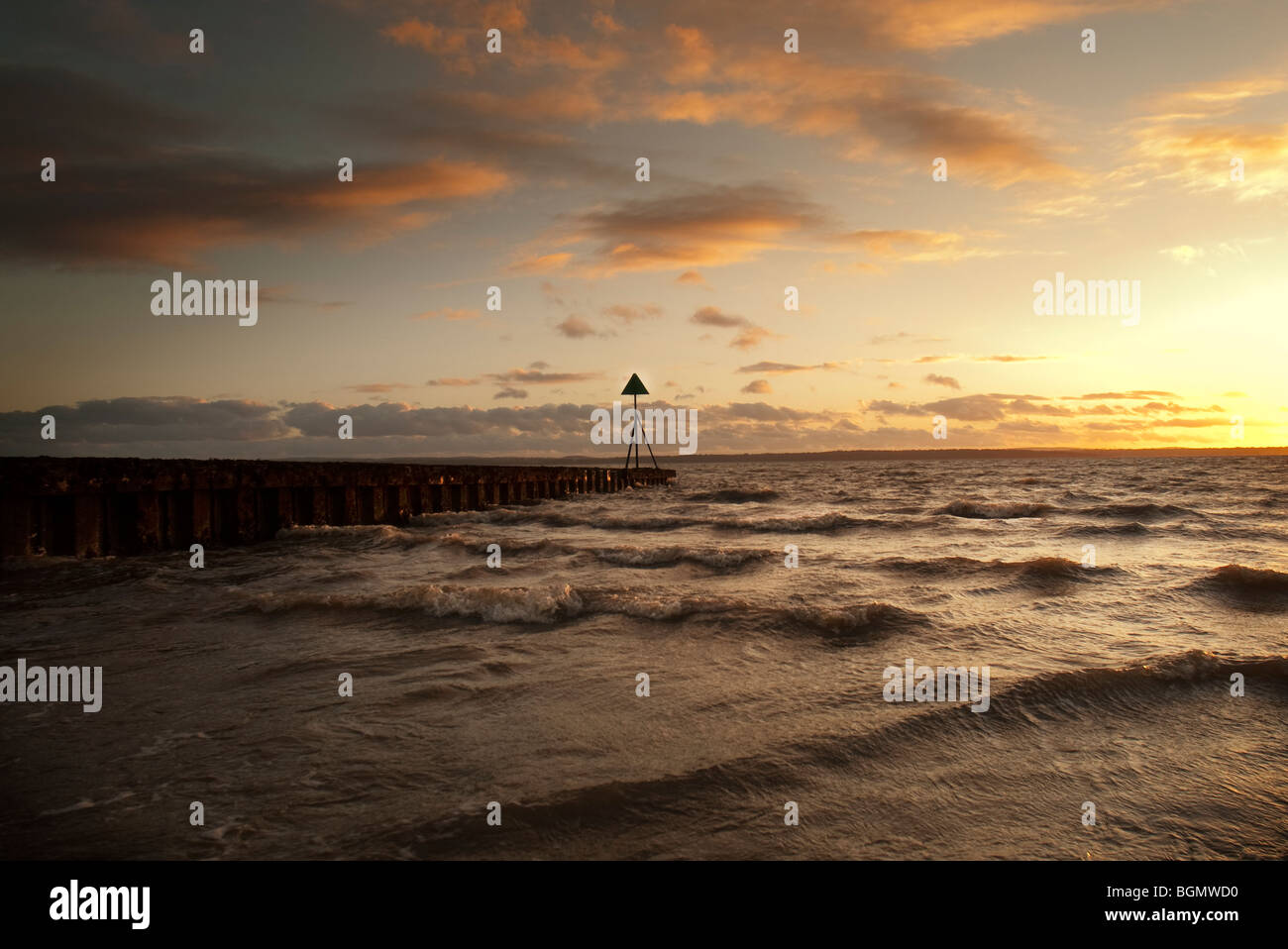 breakwater at sunset Stock Photo - Alamy