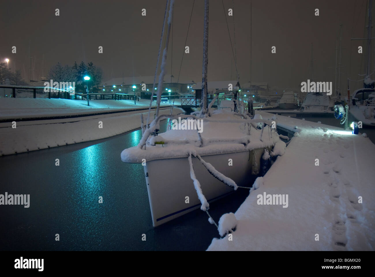yacht covered in snow Stock Photo - Alamy
