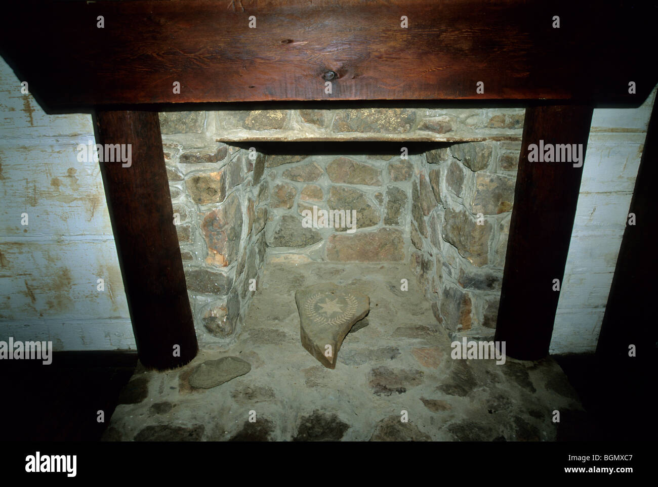 Fireplace inside a Cherokee log home built following The Trail of Tears ...