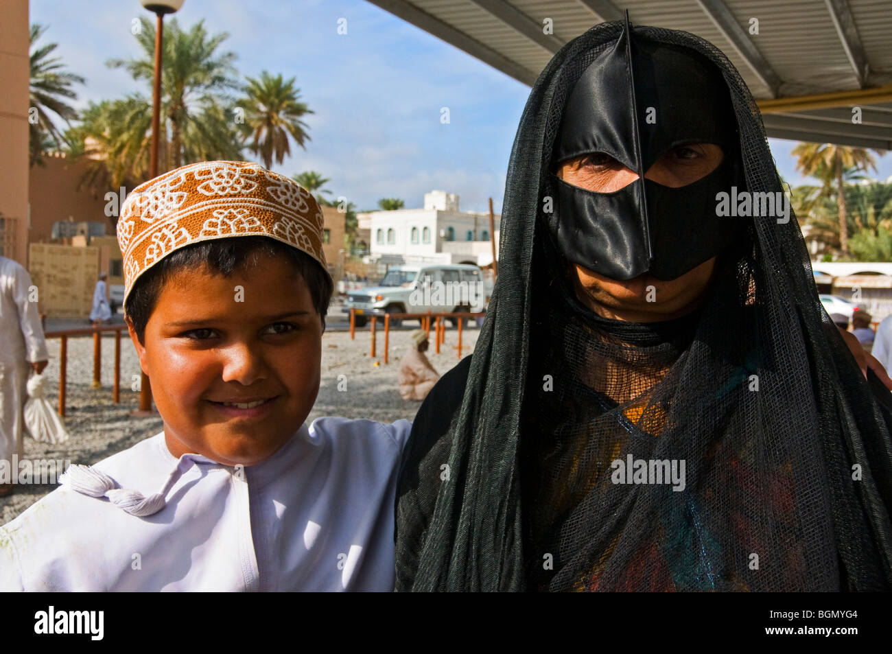 Bedouin woman wearing the traditional mask in Nizwa Oman Stock Photo ...