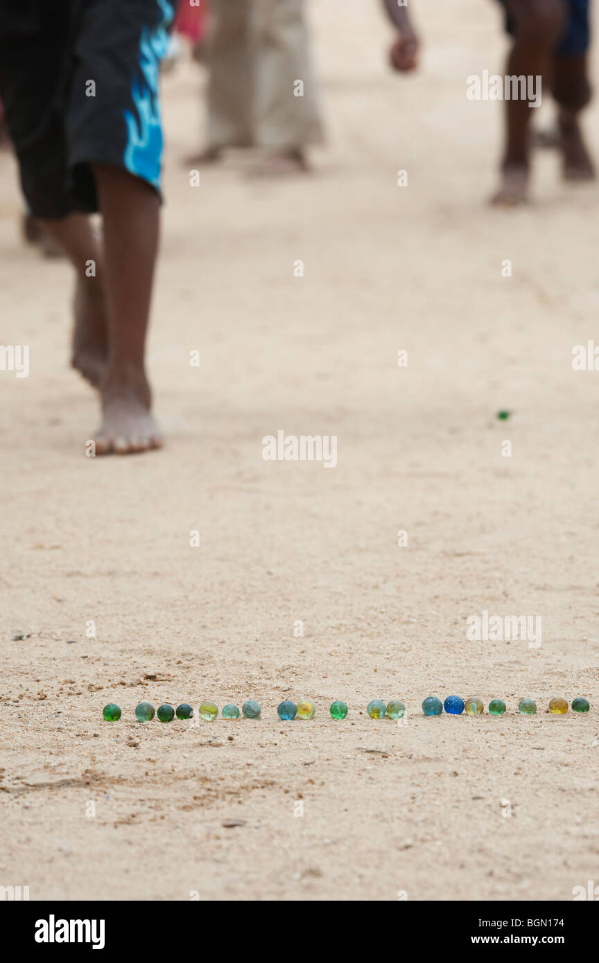 Boy playing marbles hi-res stock photography and images - Alamy