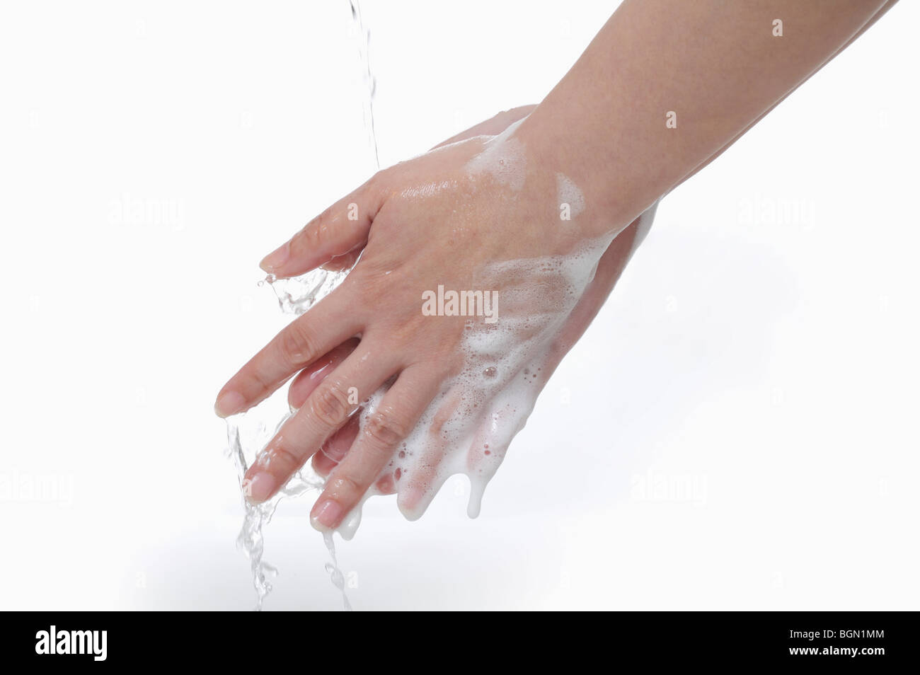 Close-up of human hands washing with soap bubbles Stock Photo - Alamy