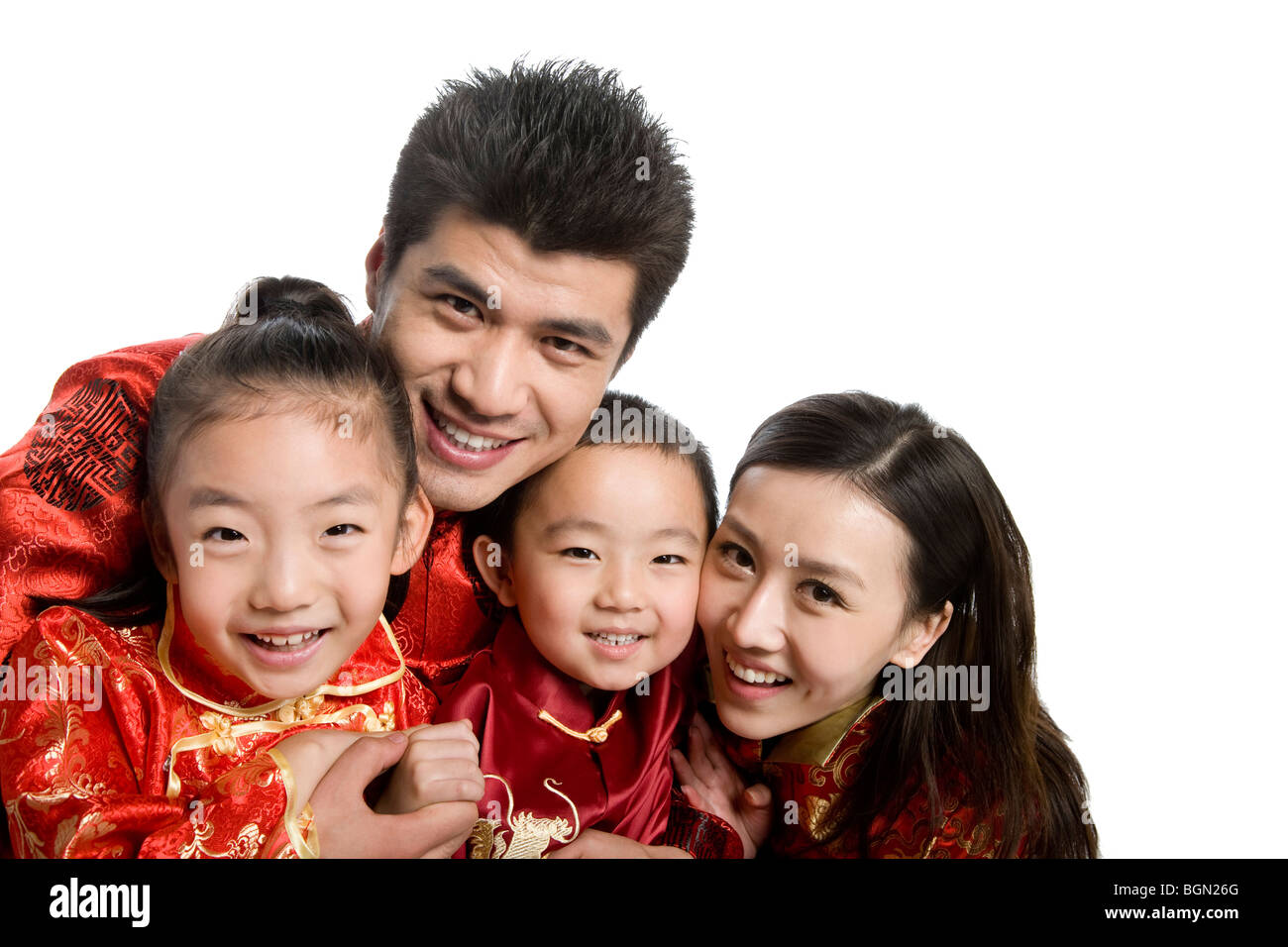 Family of four in Chinese traditional clothes Stock Photo - Alamy