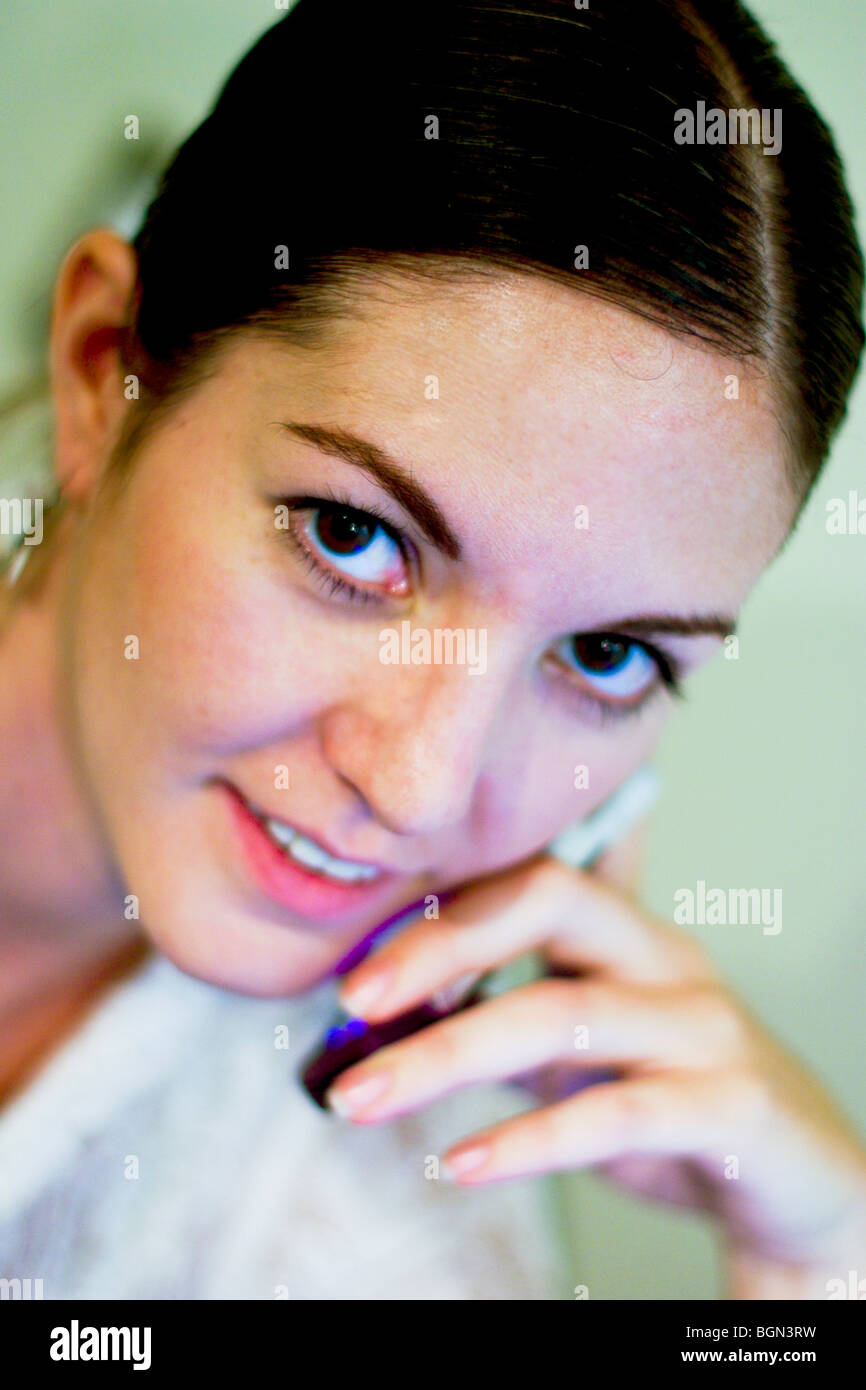 Woman portrait face talking in cellular phone Stock Photo - Alamy