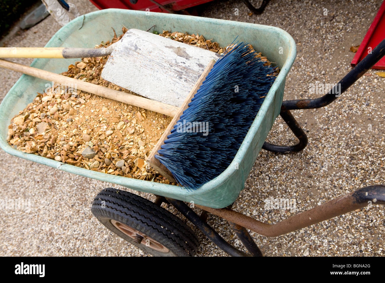 blue handbarrow in the garden Stock Photo - Alamy